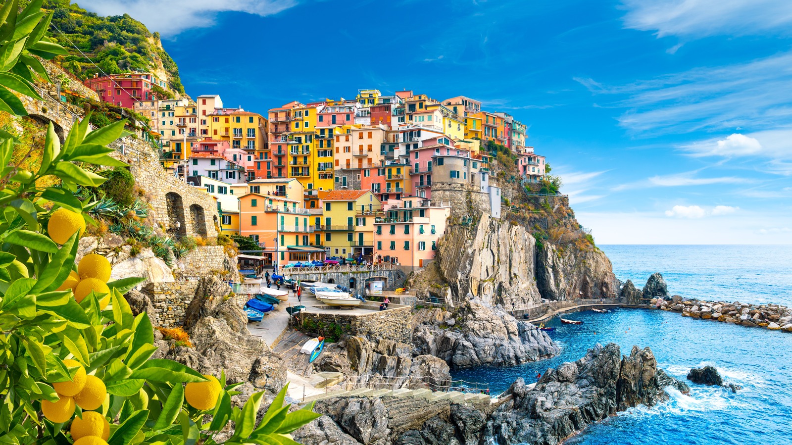 A Tiny Town Full Of Cliffs And Explosive Color Is One Of The Oldest In ...