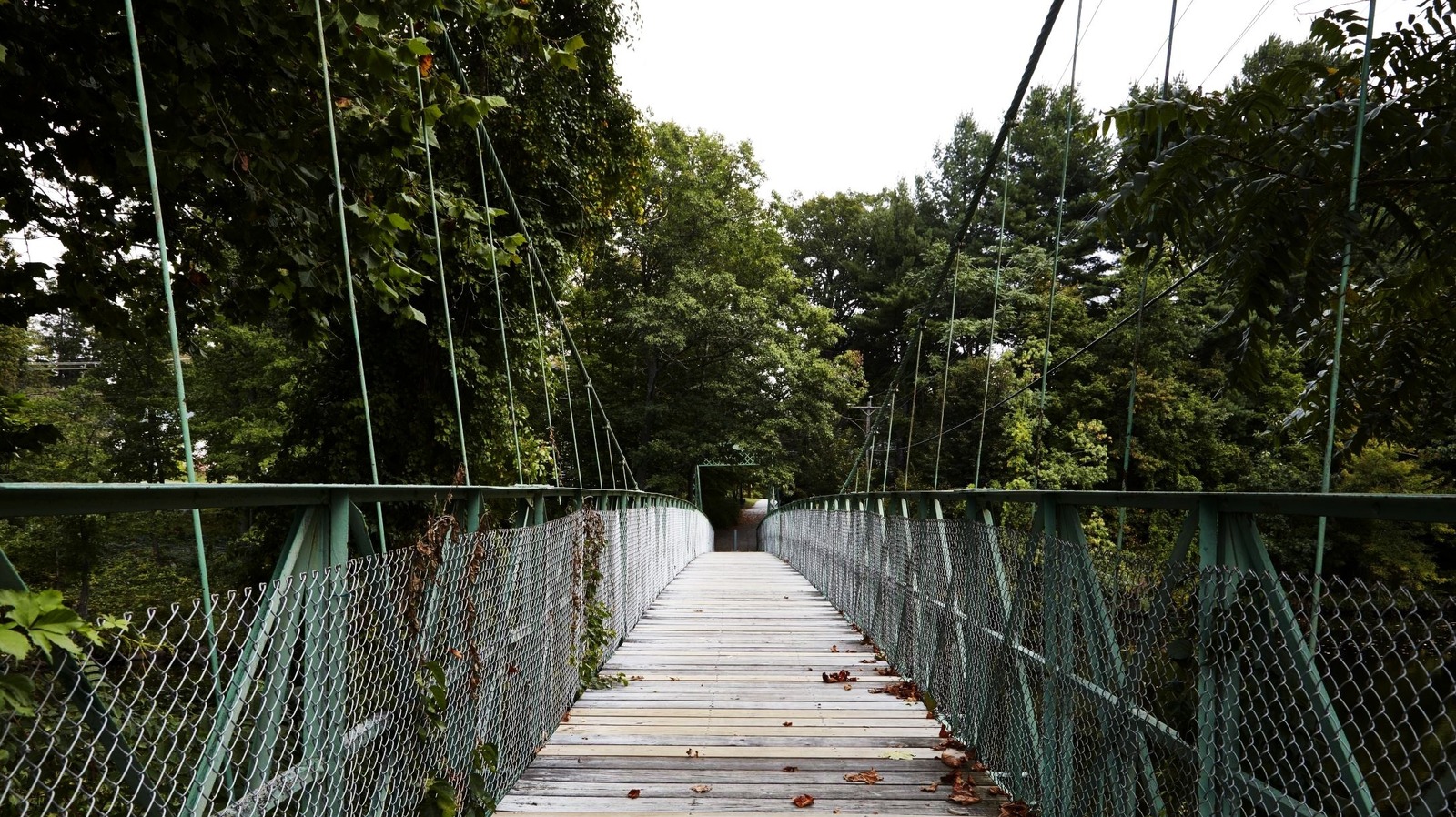 New Hampshire's Old Swinging Bridge Offers A Serene Stroll Over A ...
