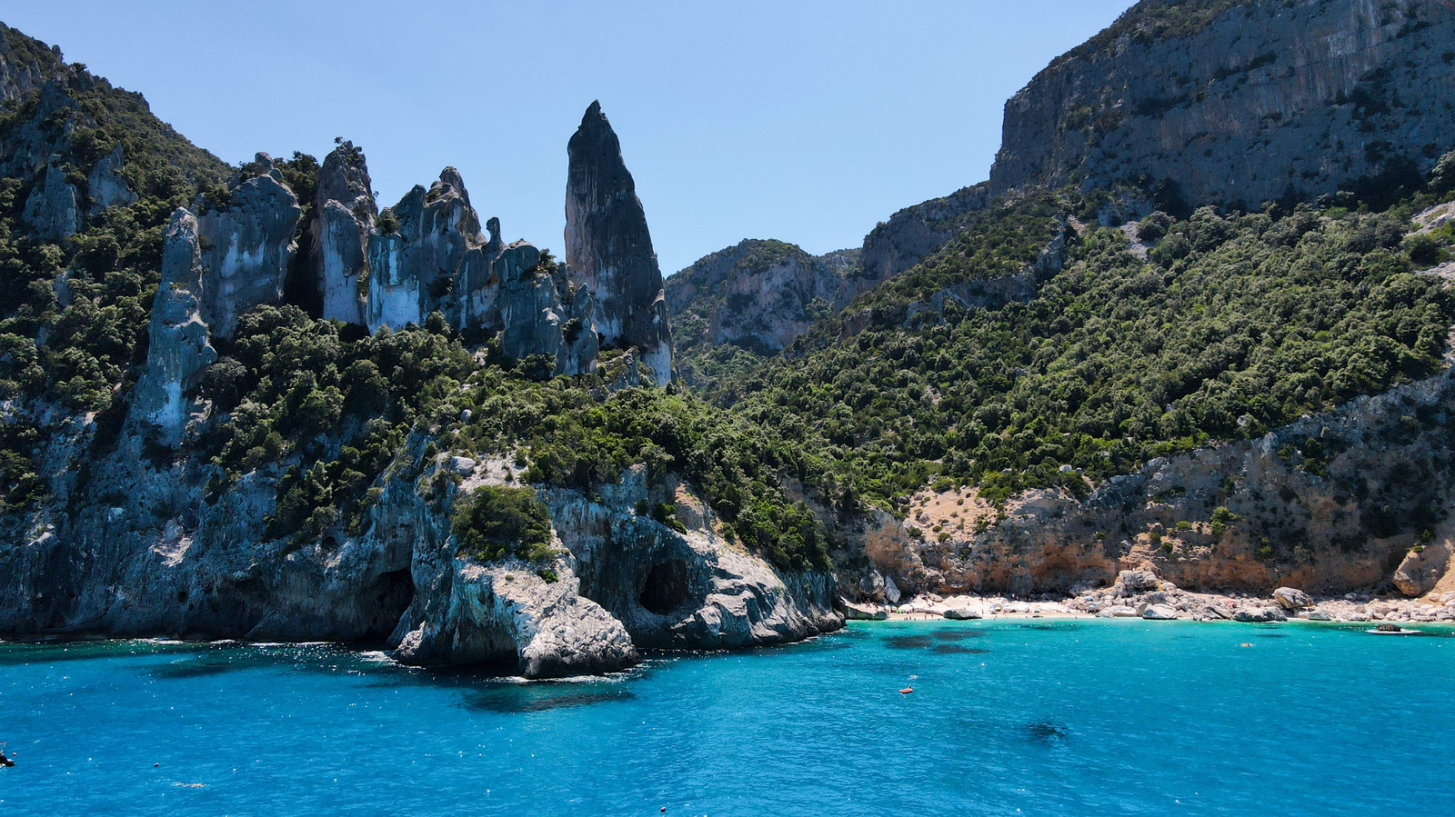 One Of The World's Best Beaches Is A Hidden Italian Cove With Sapphire ...
