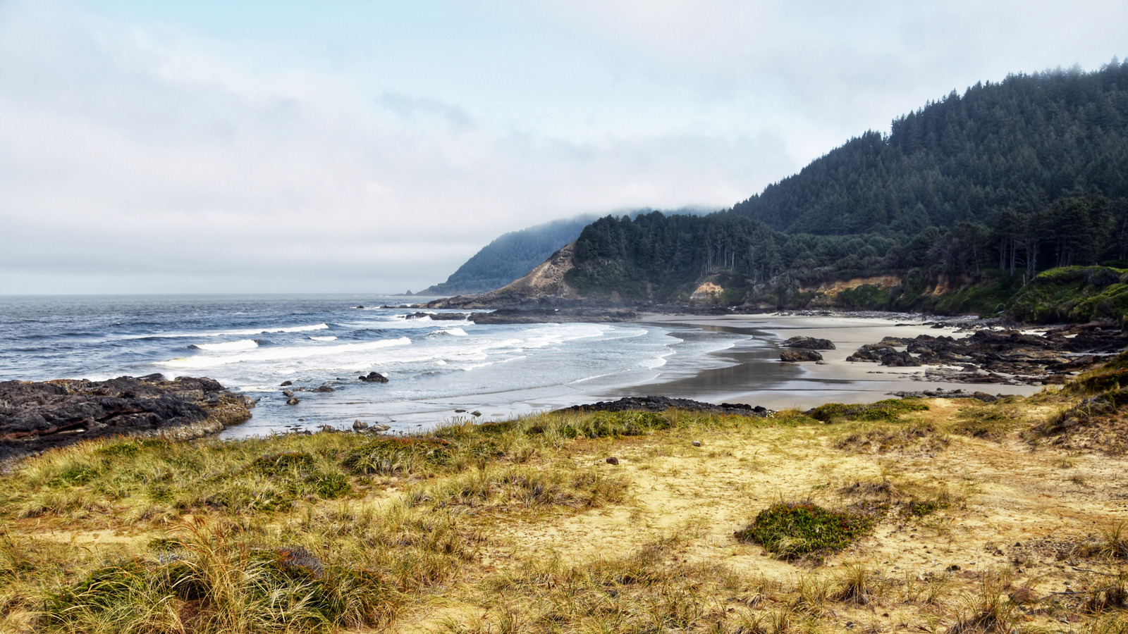 Oregon's Coastal Cliffy Viewpoint Above A Beach Boasts Panoramic Views ...