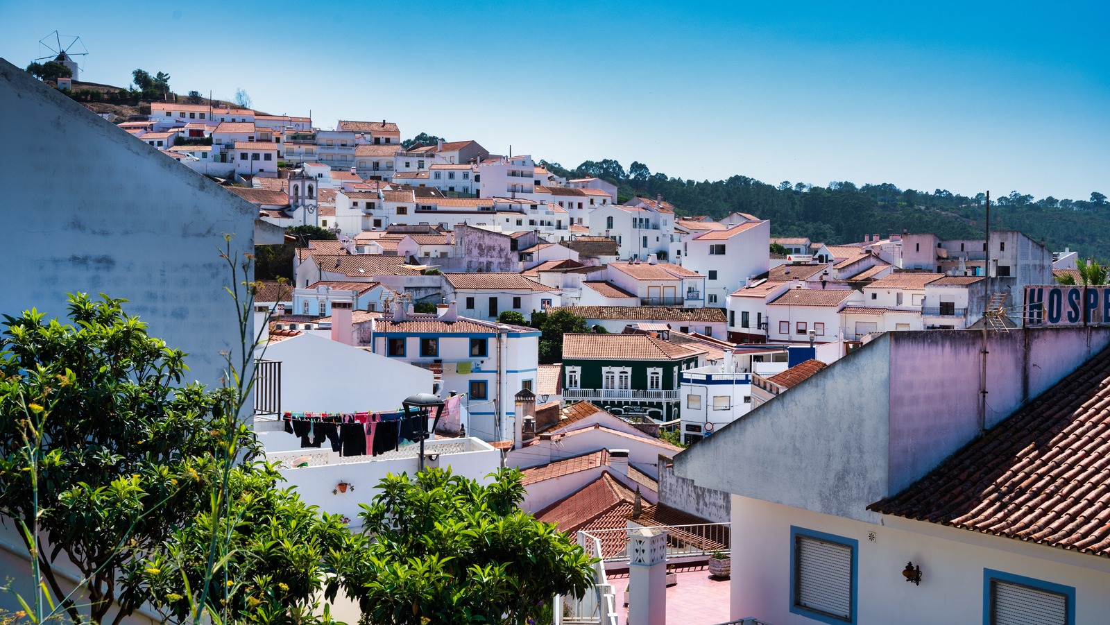 Portugal's Off-The-Beaten-Path Village By A Cliffside Beach Is An ...