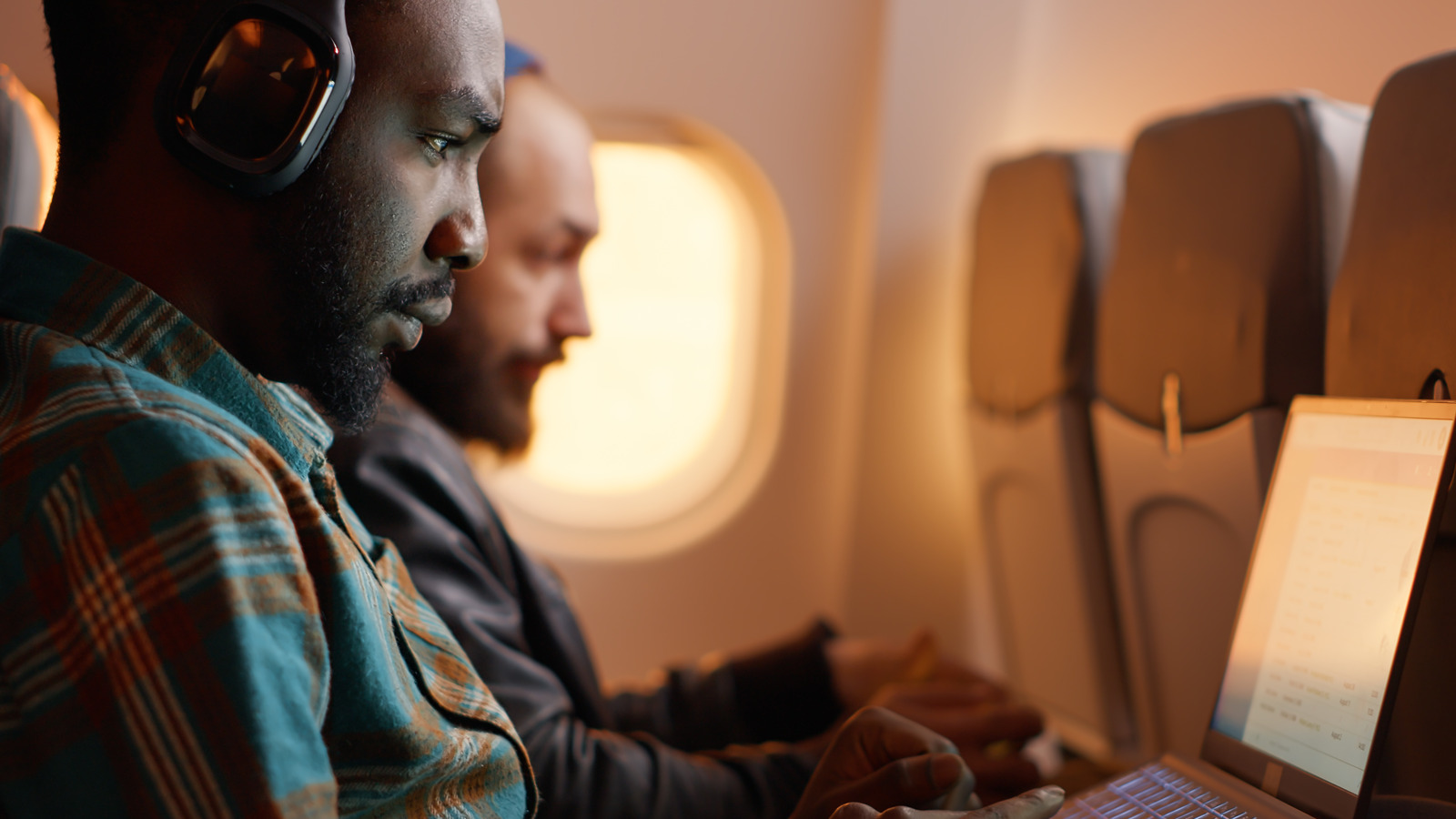 The Best Seats To Book On A Flight If You Need To Get Work Done