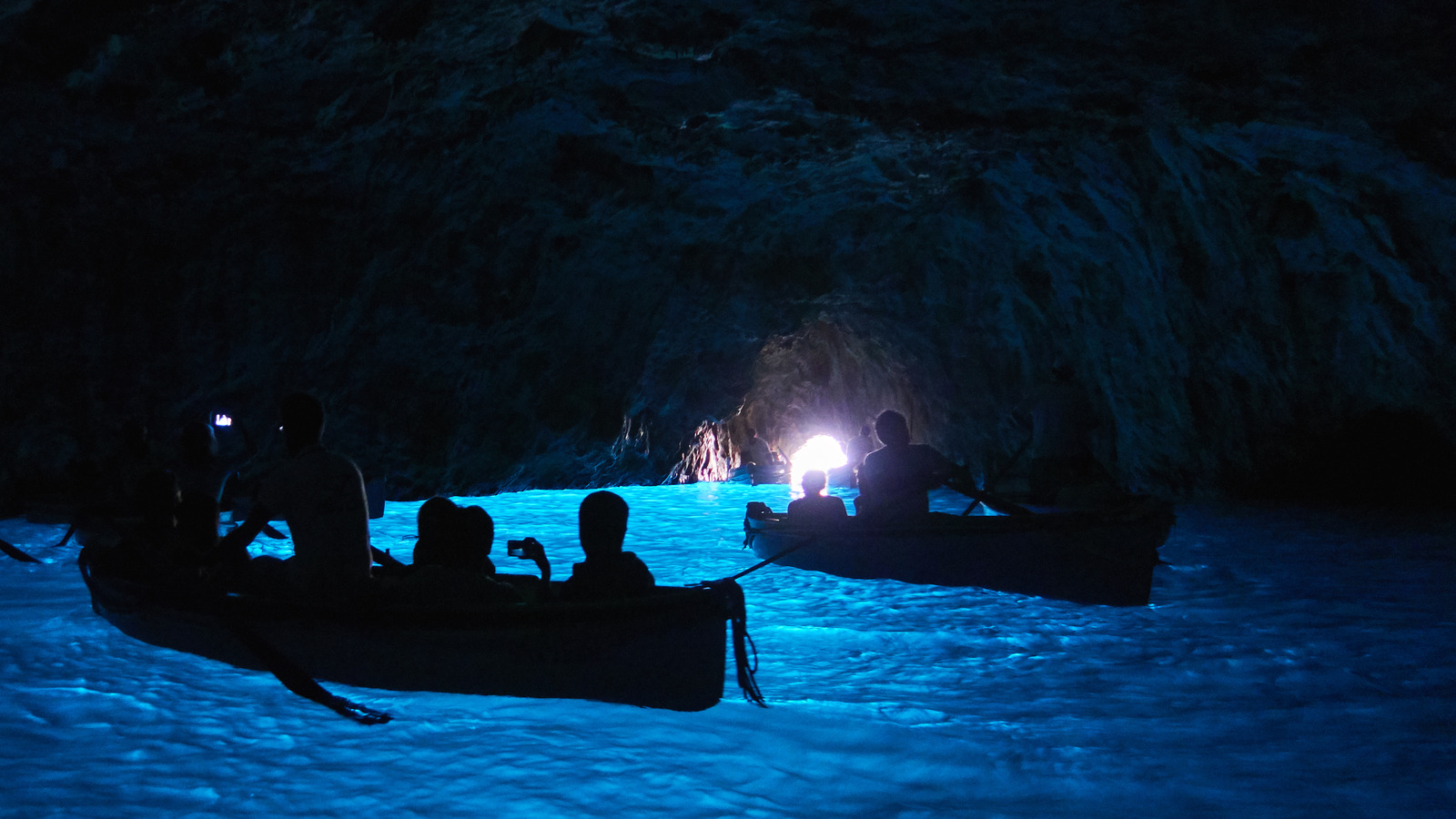 This Sea Cave In Italy With Otherworldly Blue-Glowing Water Is Not For ...